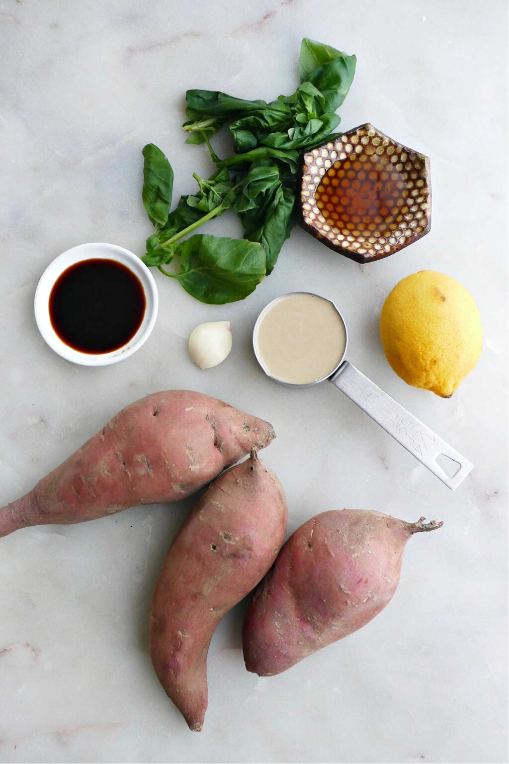 Basil Tahini Sweet Potatoes - It's a Veg World After All®