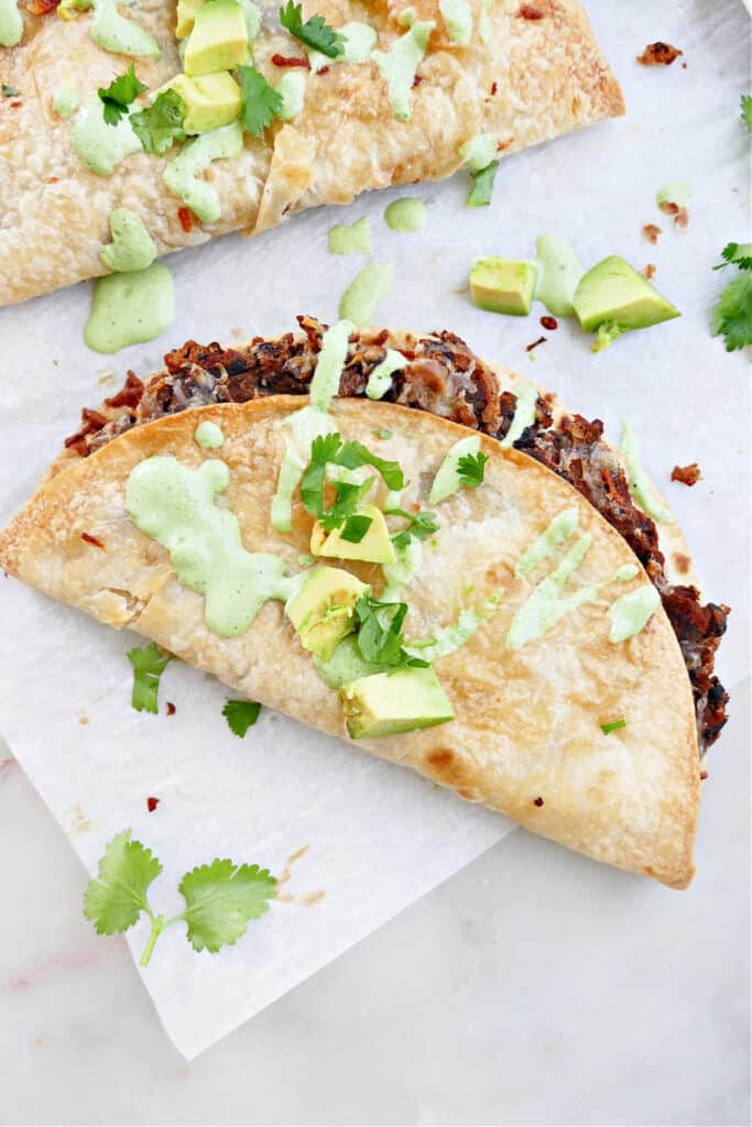 Crispy Smashed Black Bean Tacos - It's a Veg World After All®