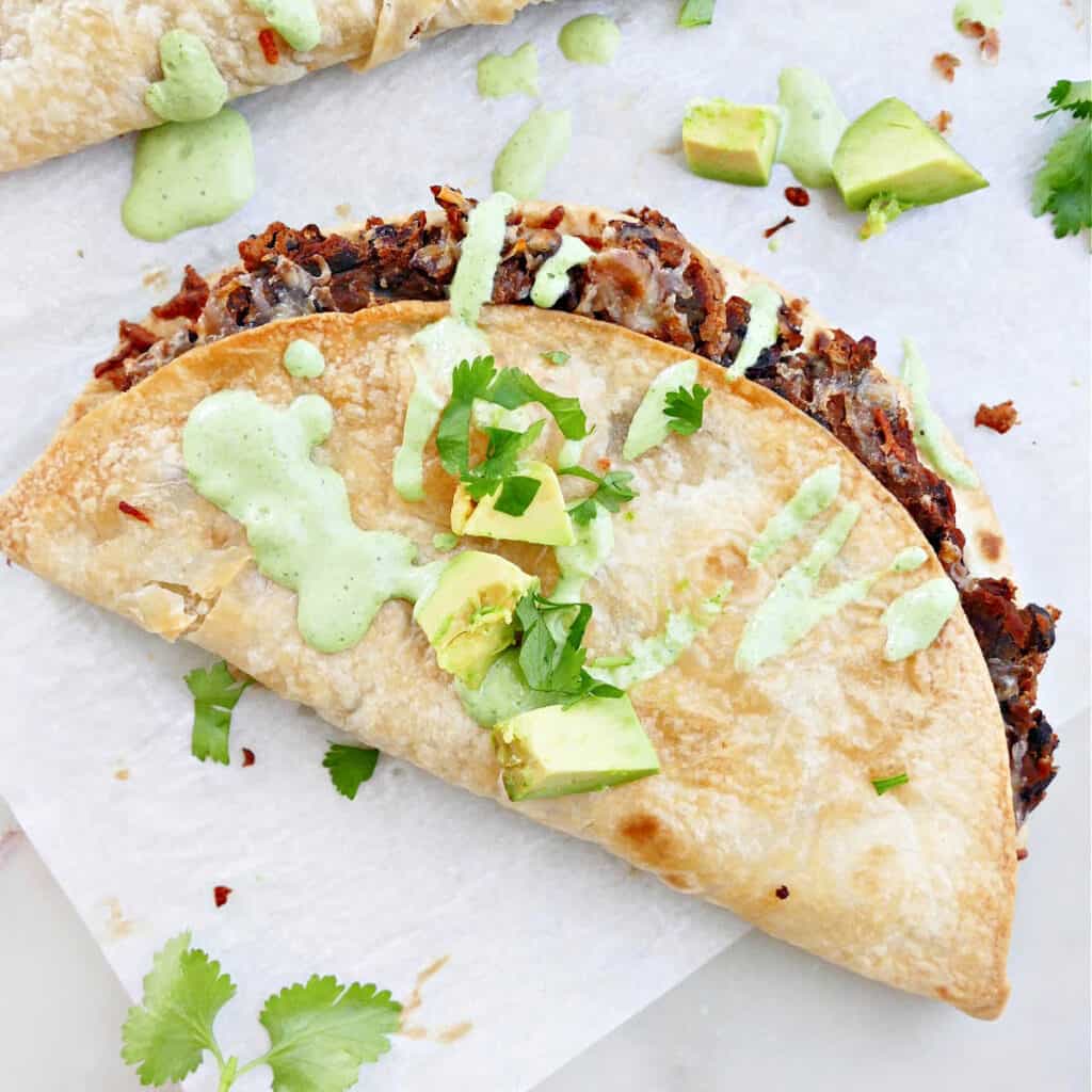 Crispy Smashed Black Bean Tacos - It's a Veg World After All®